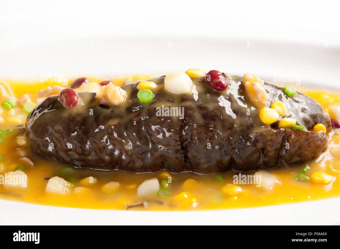Chinese cuisine-Grain stewed sea cucumber Stock Photo - Alamy