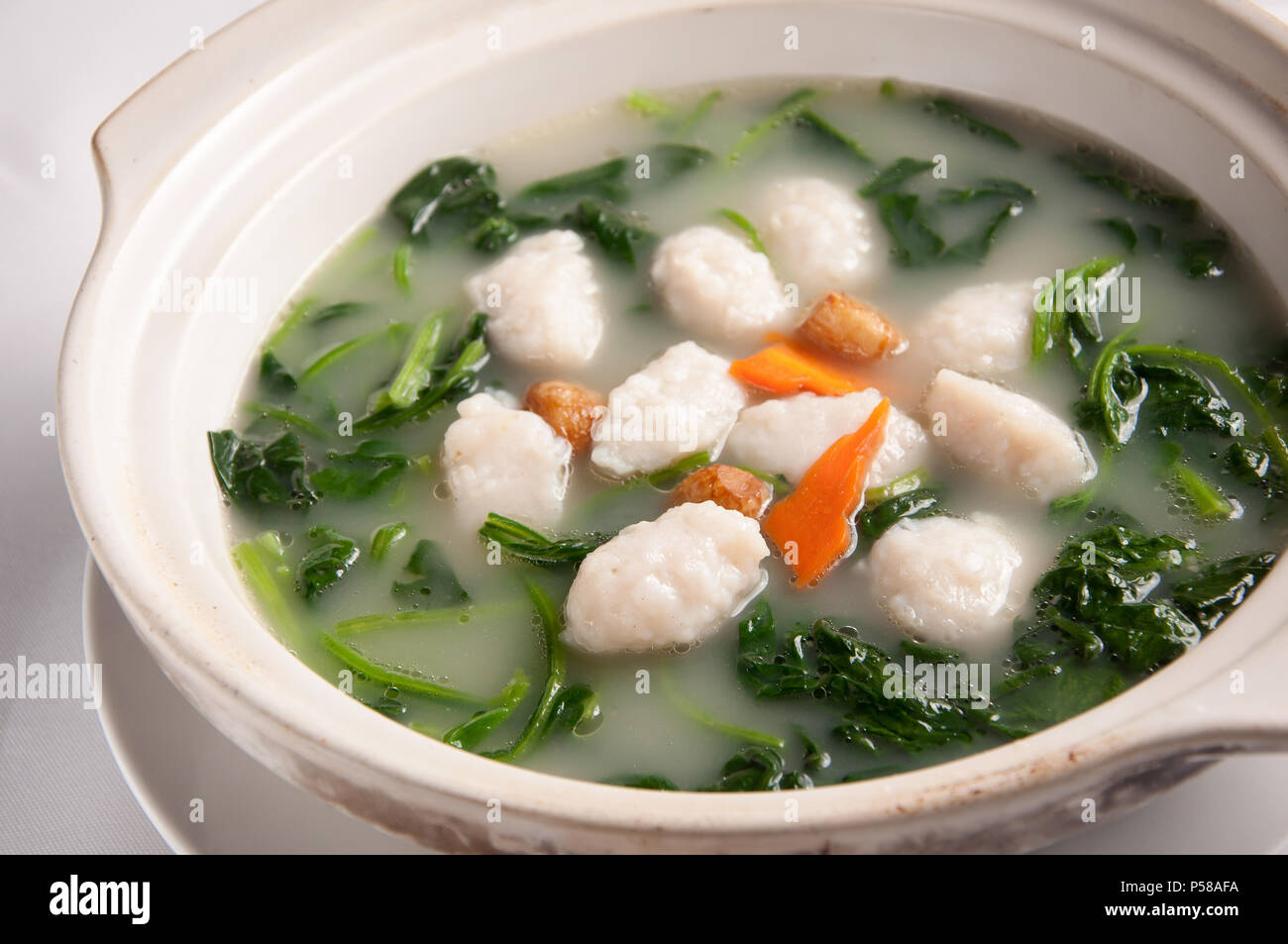 Chinese cuisine-The soup fish ball with Vegetables Stock Photo - Alamy