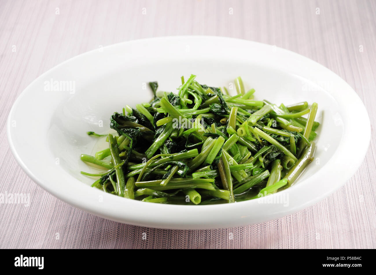 Chinese cuisine--water spinach Stock Photo - Alamy