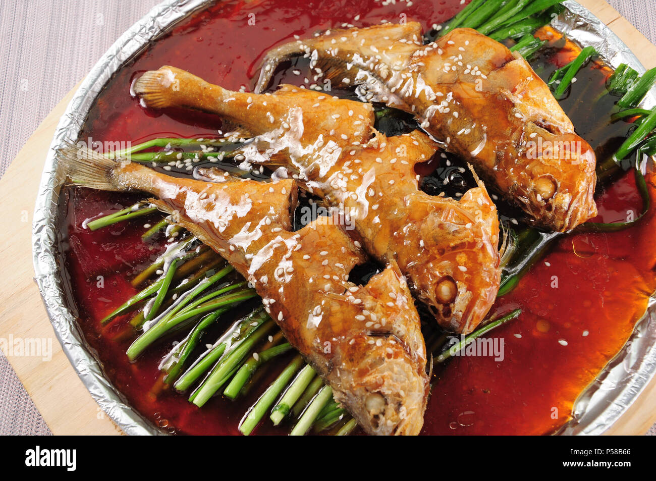 Iron of small yellow croaker hi-res stock photography and images - Alamy