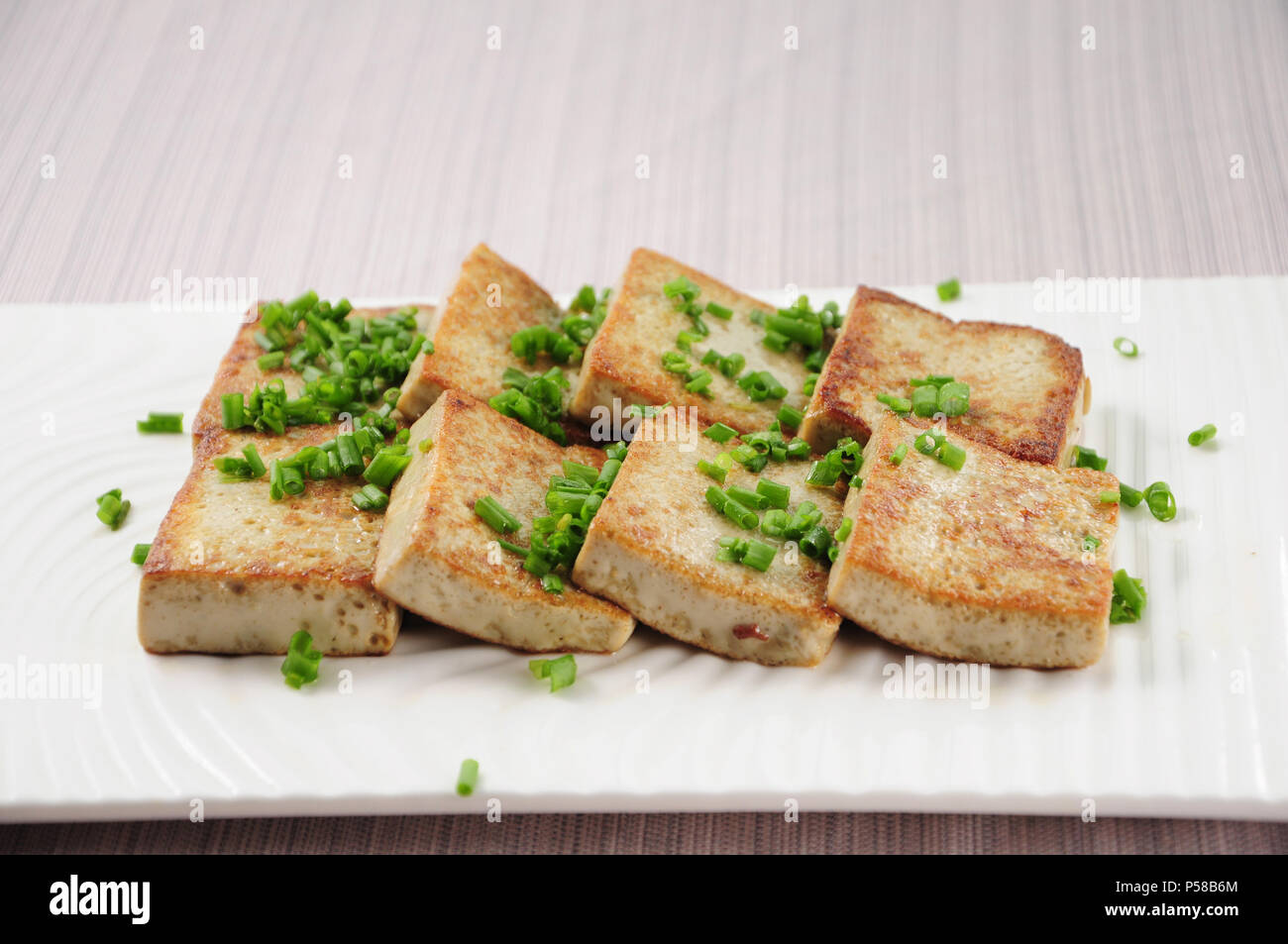 Chinese cuisine--Fried bean curd Stock Photo - Alamy