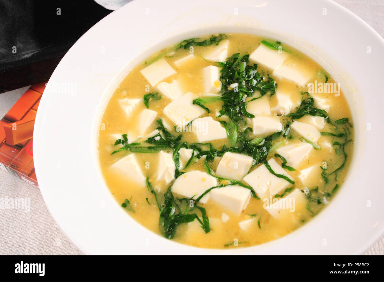 Chinese cuisine-Green vegetables tofu Stock Photo - Alamy