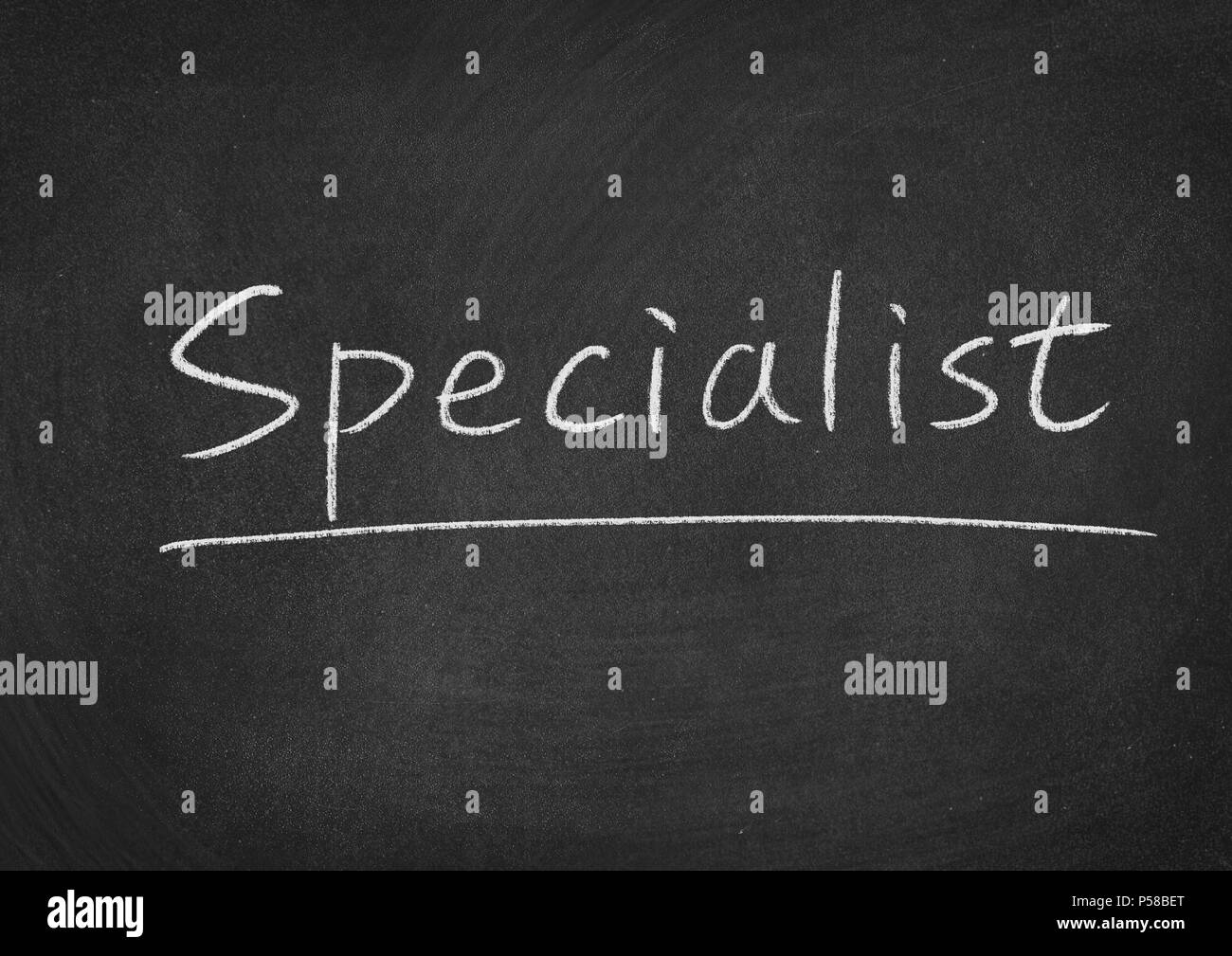 specialist concept word on a blackboard background Stock Photo - Alamy