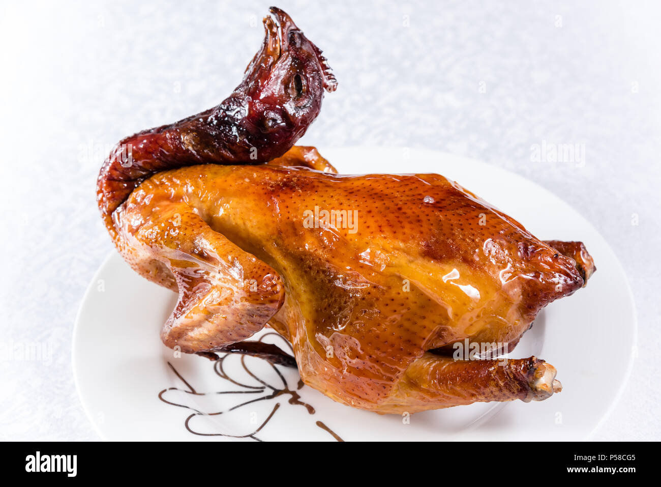Hanging roast chicken hi-res stock photography and images - Alamy