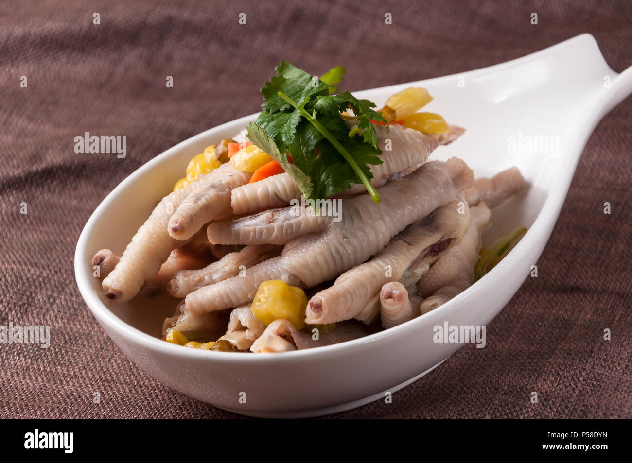 Chicken Feet with Pickled Peppers Stock Photo - Alamy