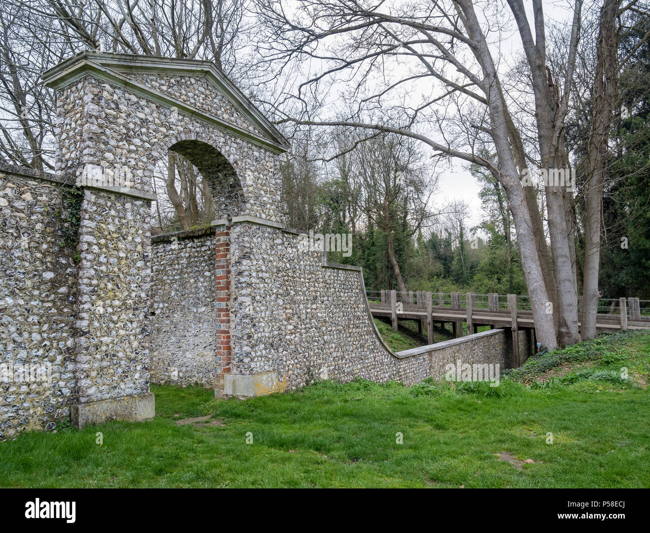 Country side view with a stone wall and gate at Chichester, United ...