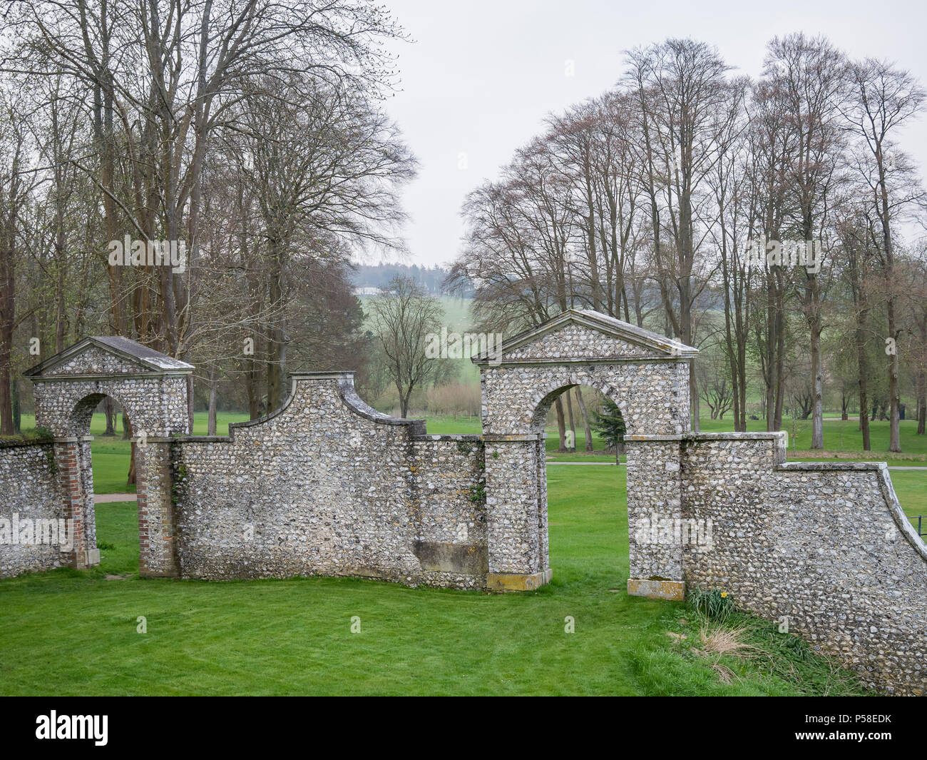 Country side view with a stone wall and gate at Chichester, United ...