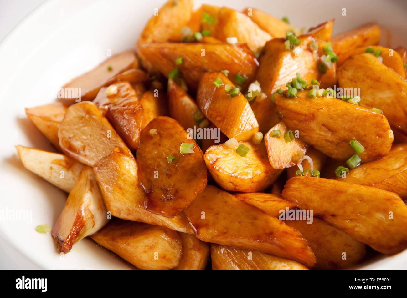 Chinese cuisine-Braised wild rice shoots Stock Photo - Alamy