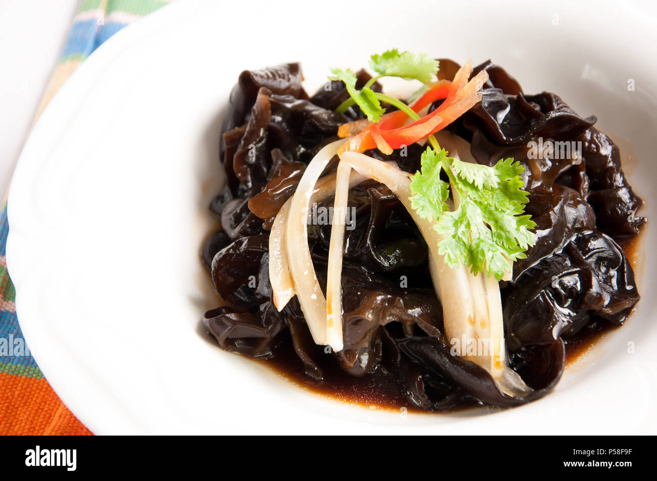 Chinese cuisine-Onion mix fungus Stock Photo - Alamy