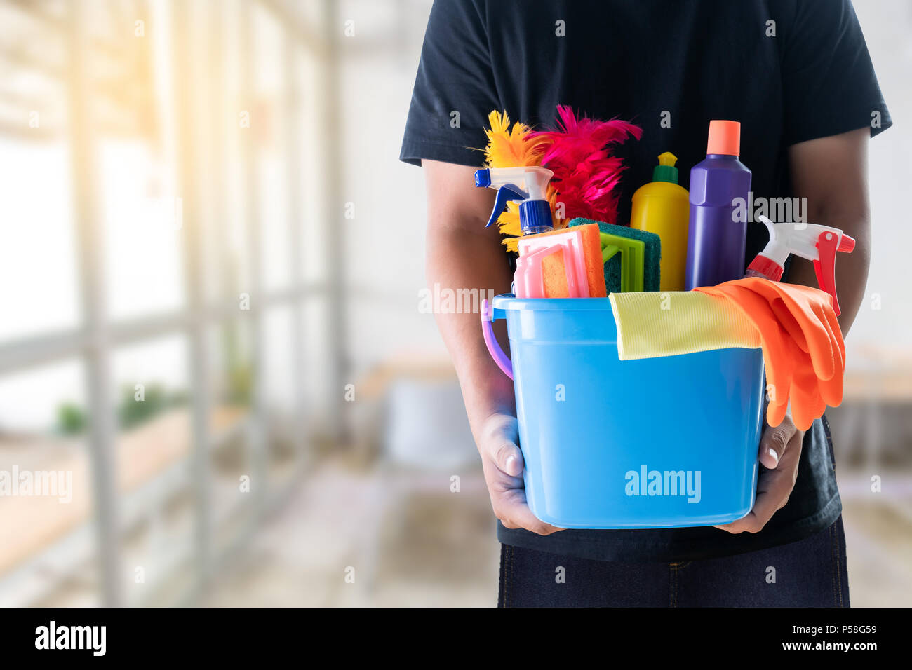 man cleaning service concept clean room and office tools Stock Photo ...
