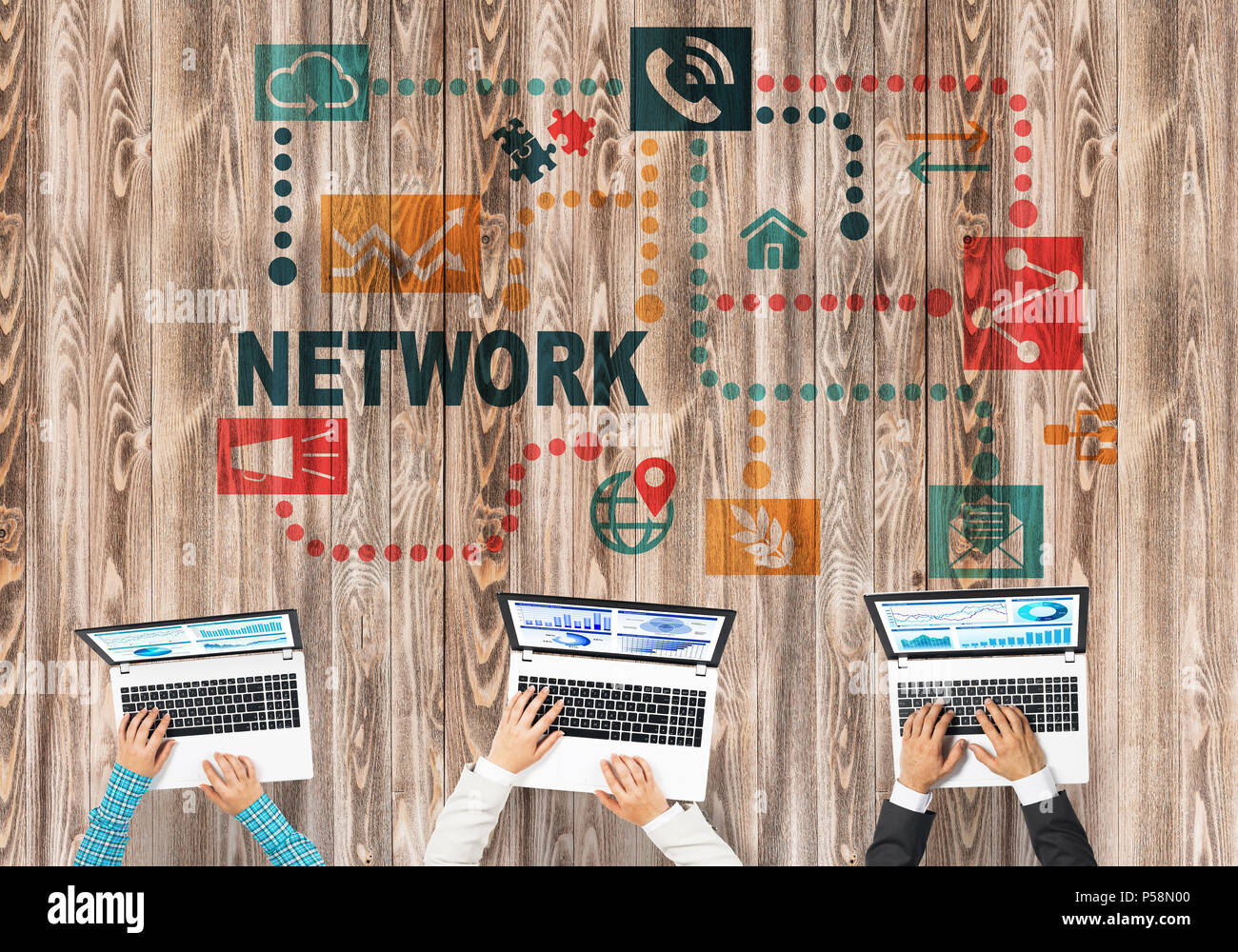 Group of three people with devices in hands working together as symbol ...