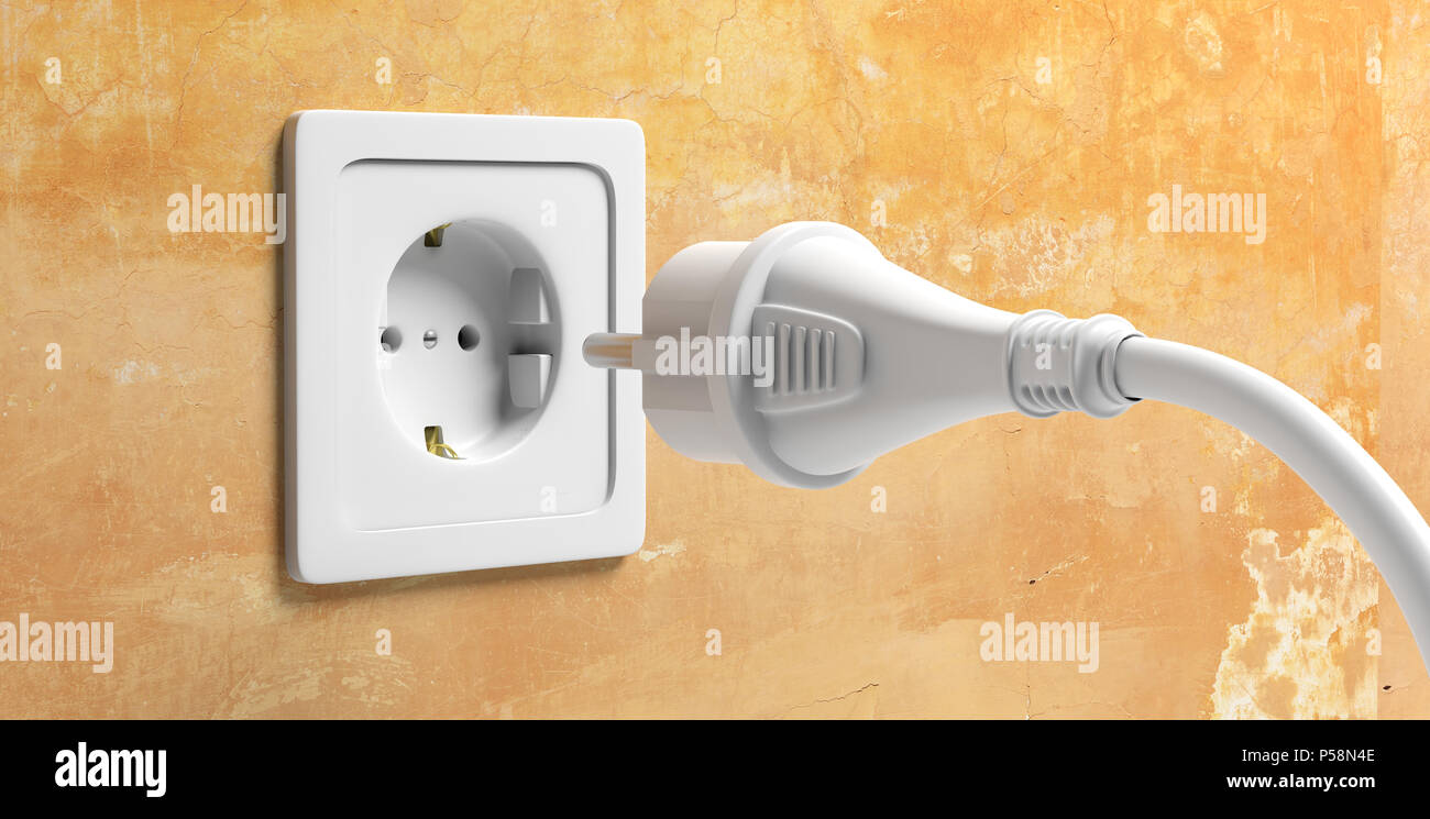 Ready to connect. White power plug and electric socket on yellow wall ...