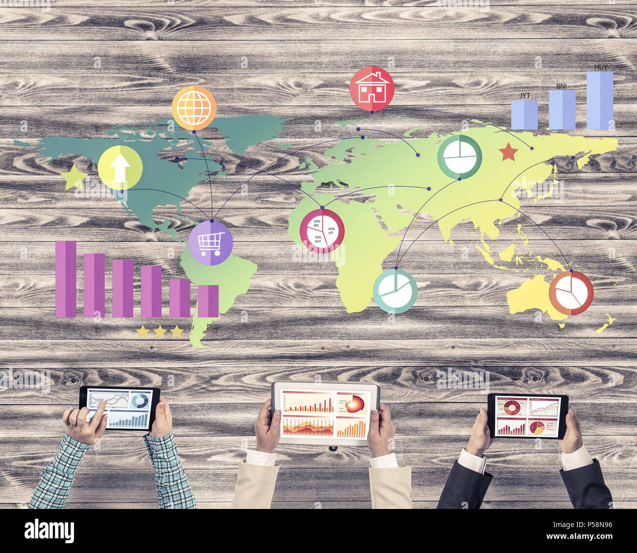 Group of three people with devices in hands working together as symbol ...