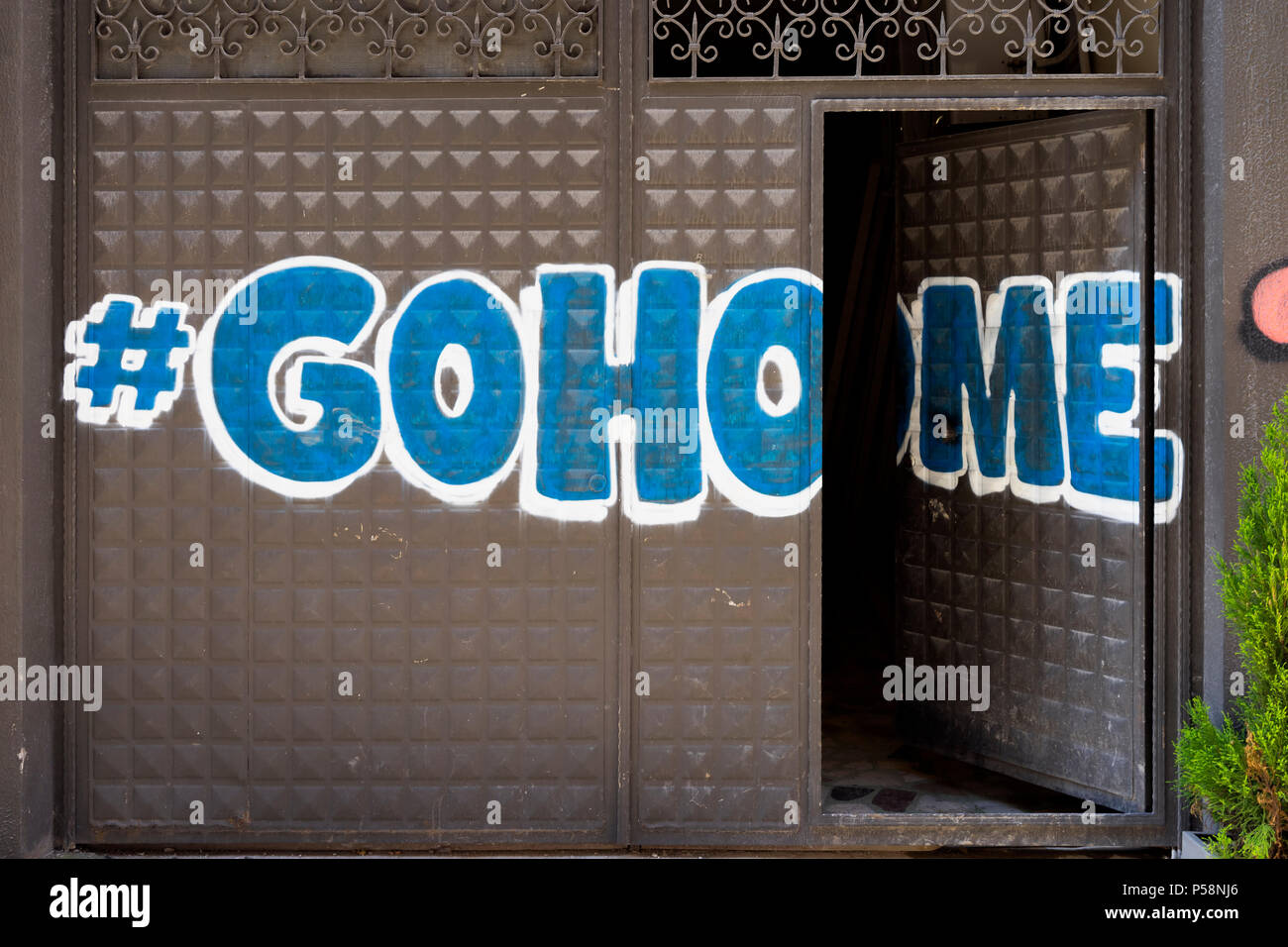 Graffiti on old gate hi-res stock photography and images - Alamy