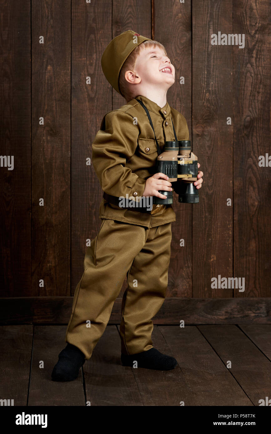 children are dressed as soldier in retro military uniforms Stock Photo ...