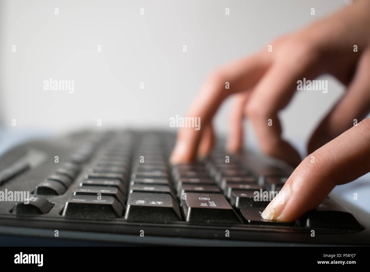 working with keyboard Stock Photo - Alamy