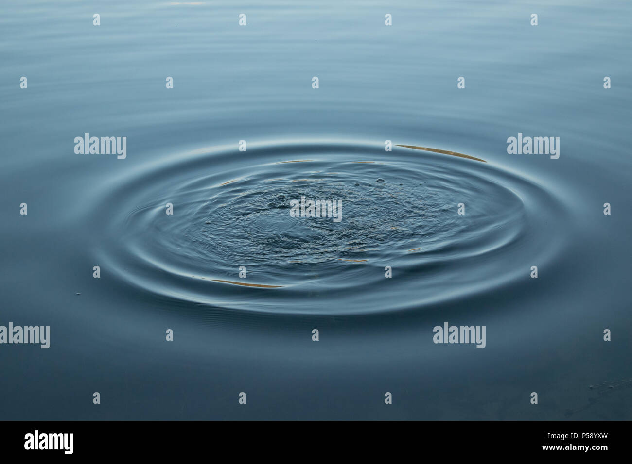 waterdrop on lake idro Stock Photo - Alamy