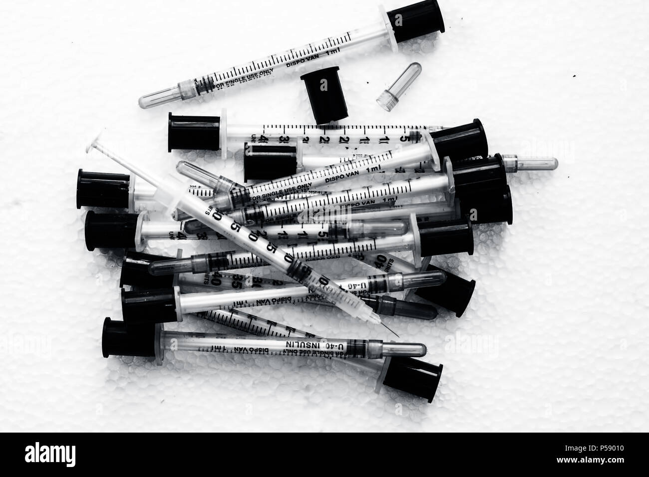 Close up of a bunch of unused syringes isolated on white Stock Photo ...