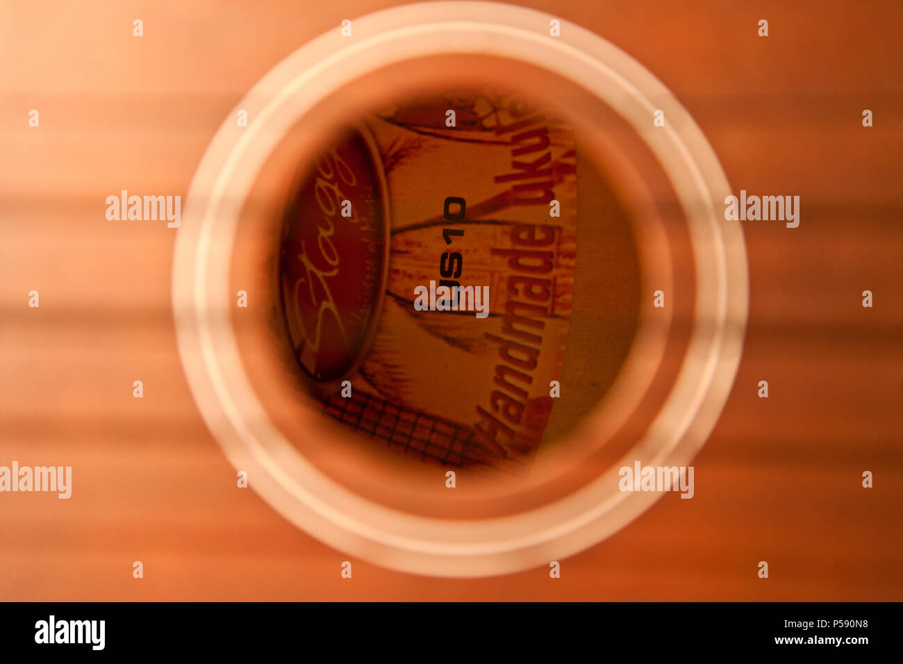 Ukulele sound hole in closeup Stock Photo - Alamy
