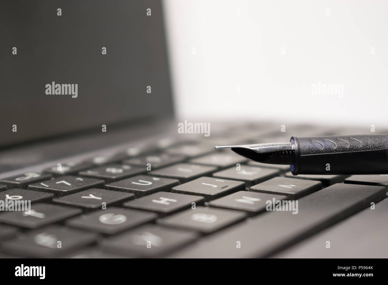 keyboard and fountain pen Stock Photo - Alamy