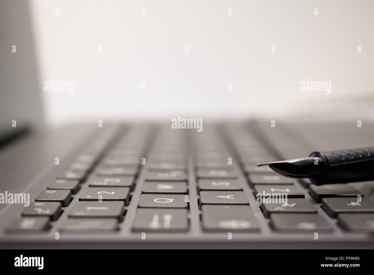 keyboard and fountain pen Stock Photo - Alamy