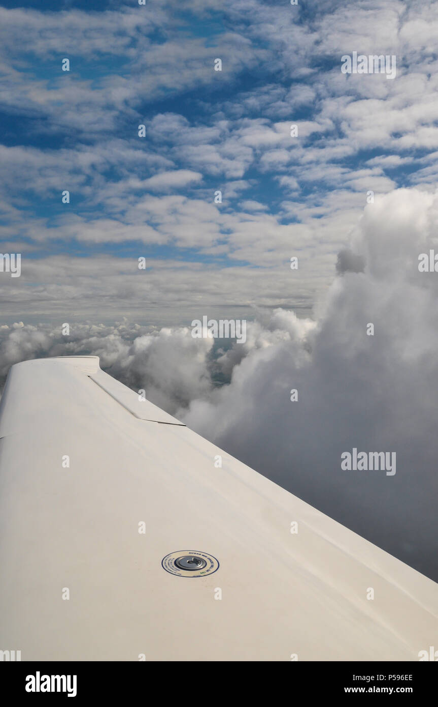 Light plane flying under sky hi-res stock photography and images - Alamy