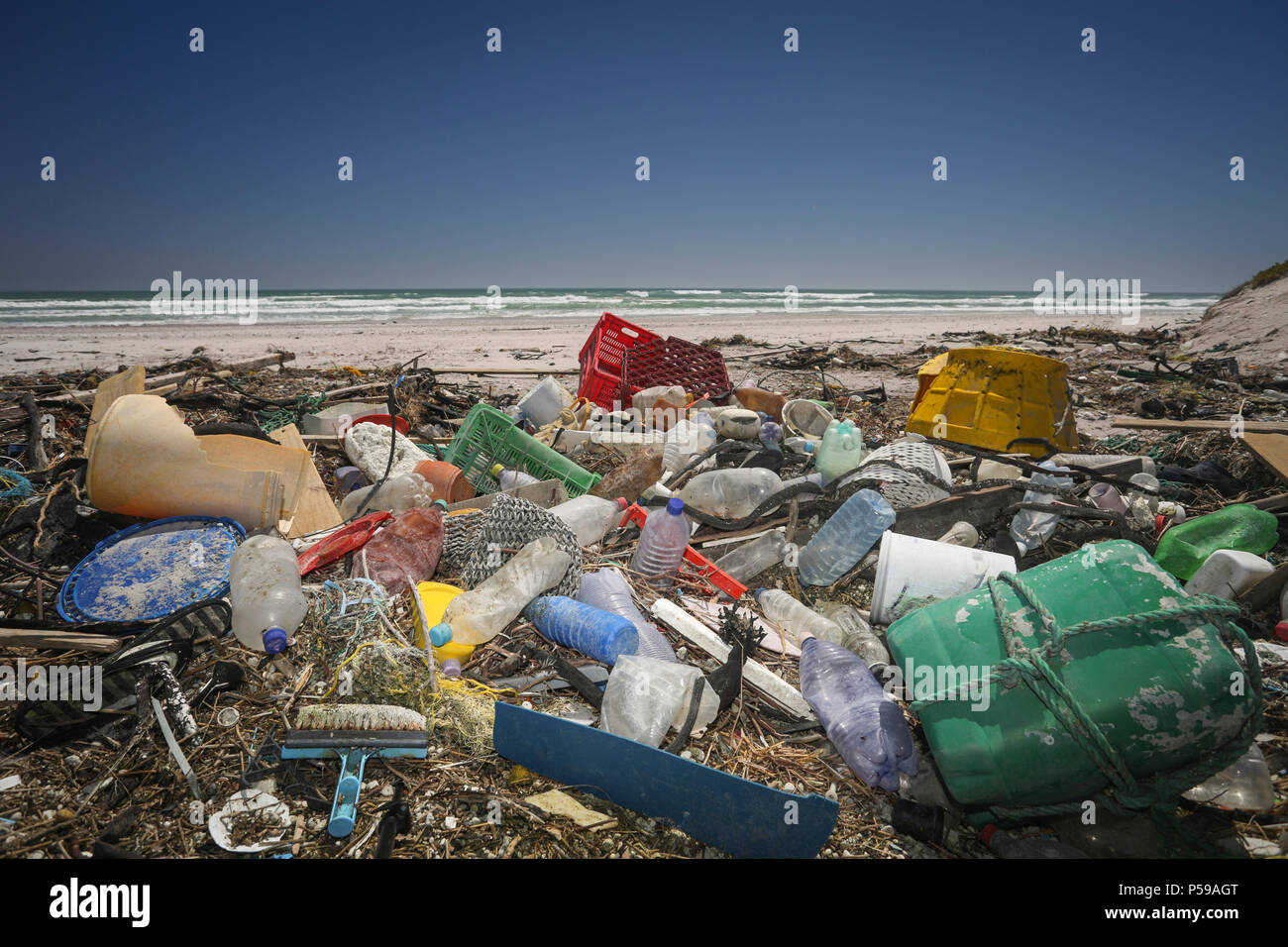 Plastic pollution on beach Stock Photo - Alamy