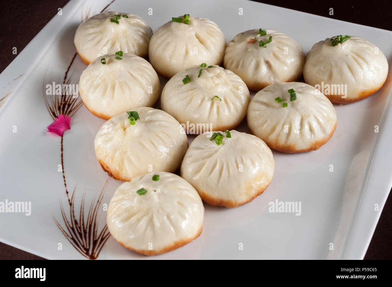 Pan-Fried Baozi Stuffed with Pork Stock Photo - Alamy