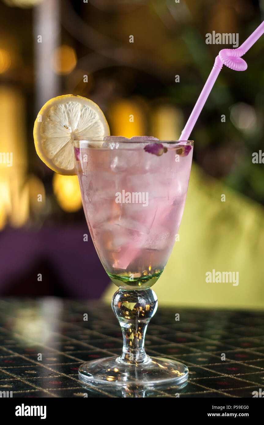 Pink drink with lemon Stock Photo - Alamy