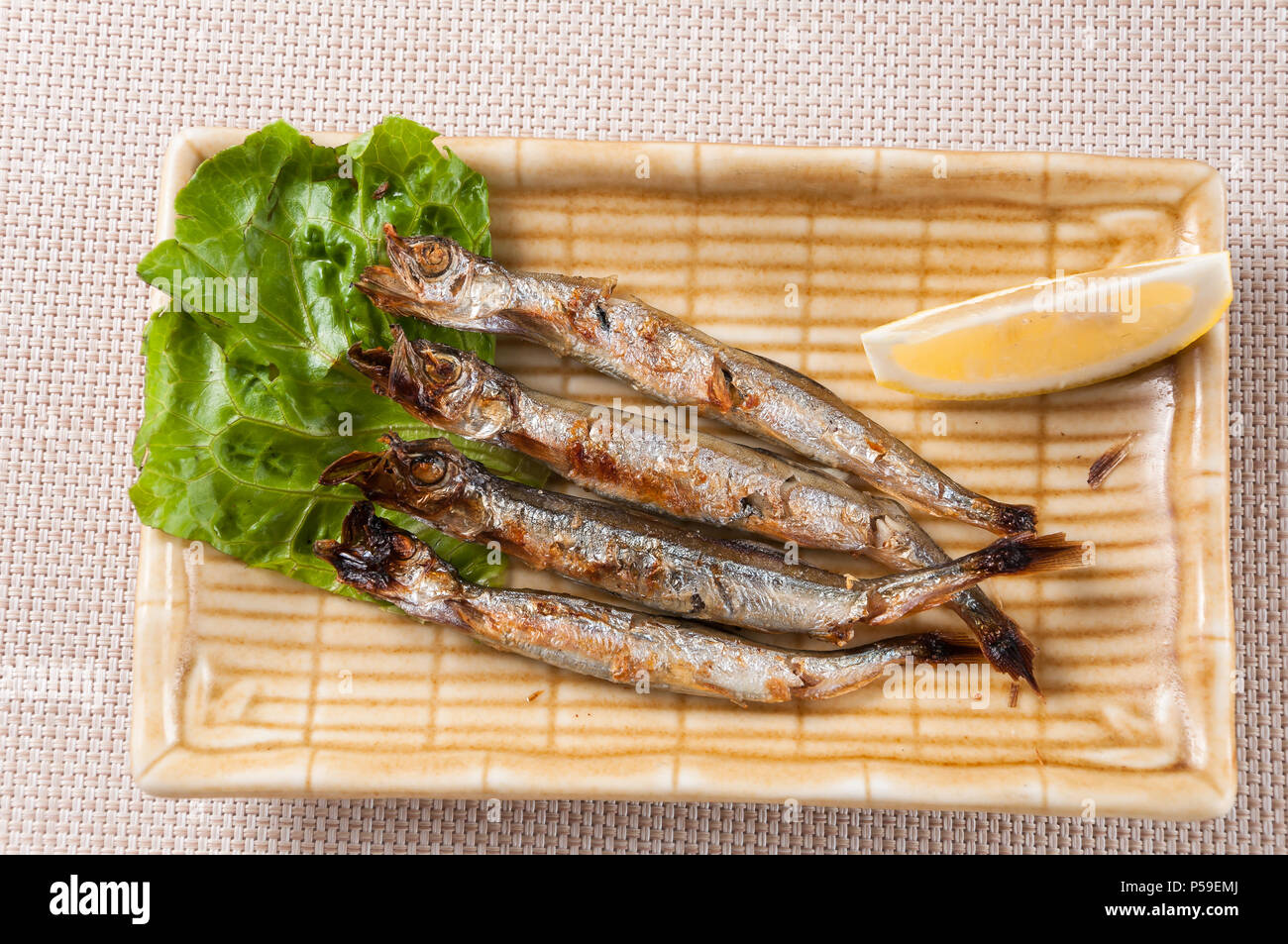 Japanese grilled capelin Stock Photo - Alamy