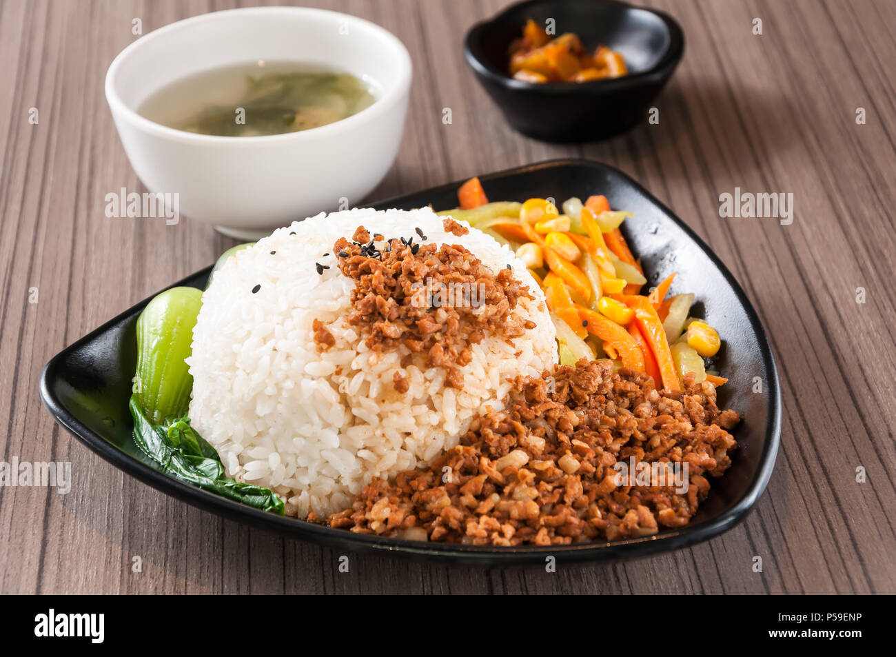 Steamed Rice with Red-Cooked Pork,Chinese fast food Stock Photo - Alamy