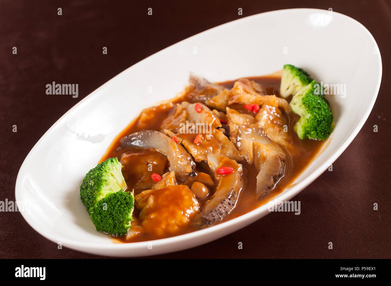 Braised sea cucumber with oyster sauce Stock Photo - Alamy