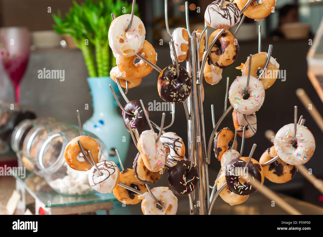 Hanging donut hi-res stock photography and images - Alamy