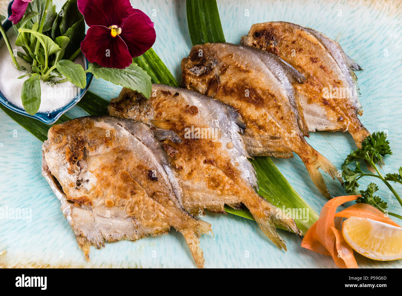 Pomfret with lime hi-res stock photography and images - Alamy