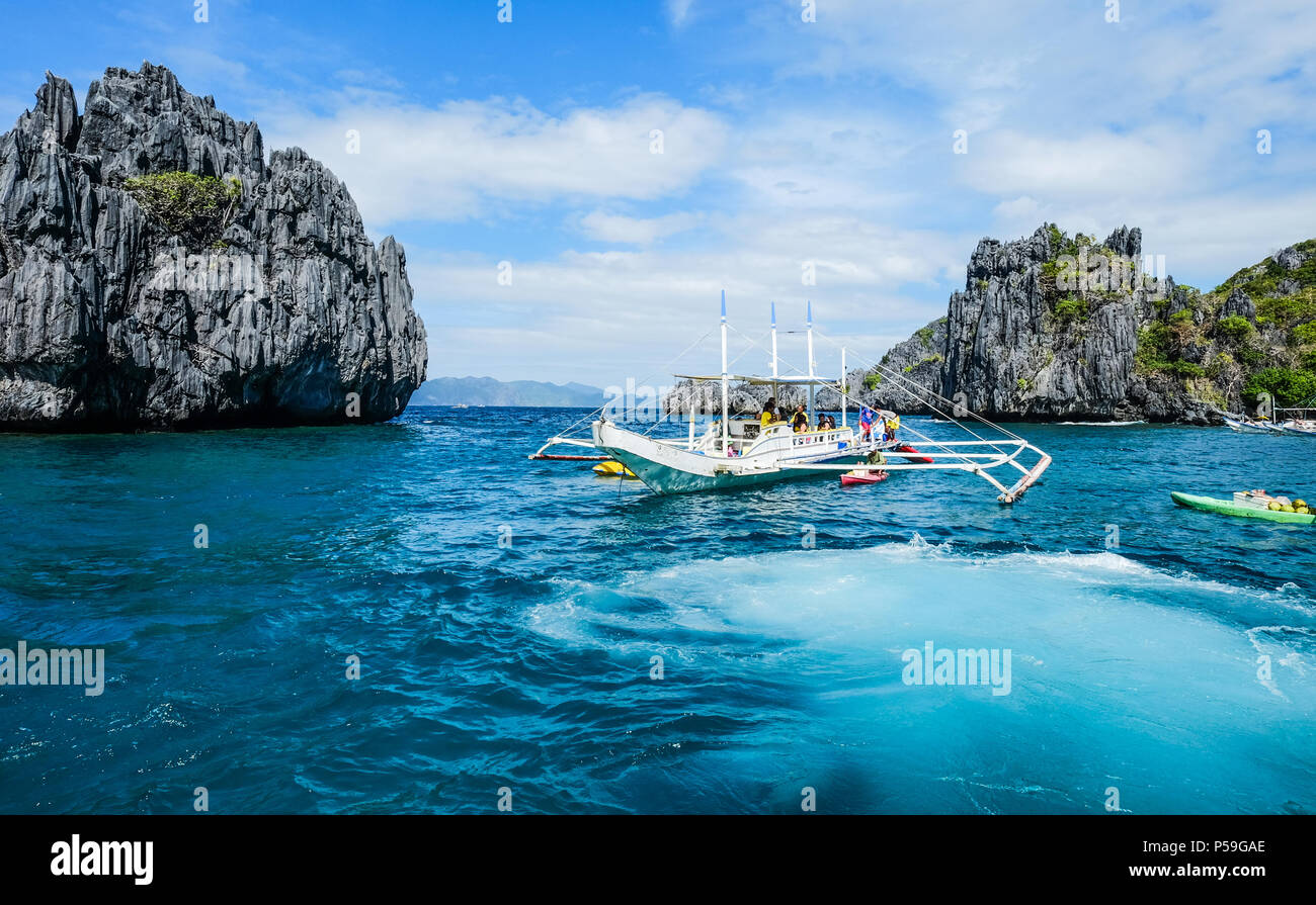 Palawan, Philippines - Apr 5, 2017. A wooden boat on lagoon in Palawan ...