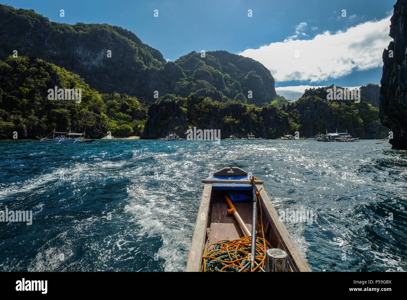 A wooden boat on lagoon in Palawan, Philippines. Palawan is the island ...