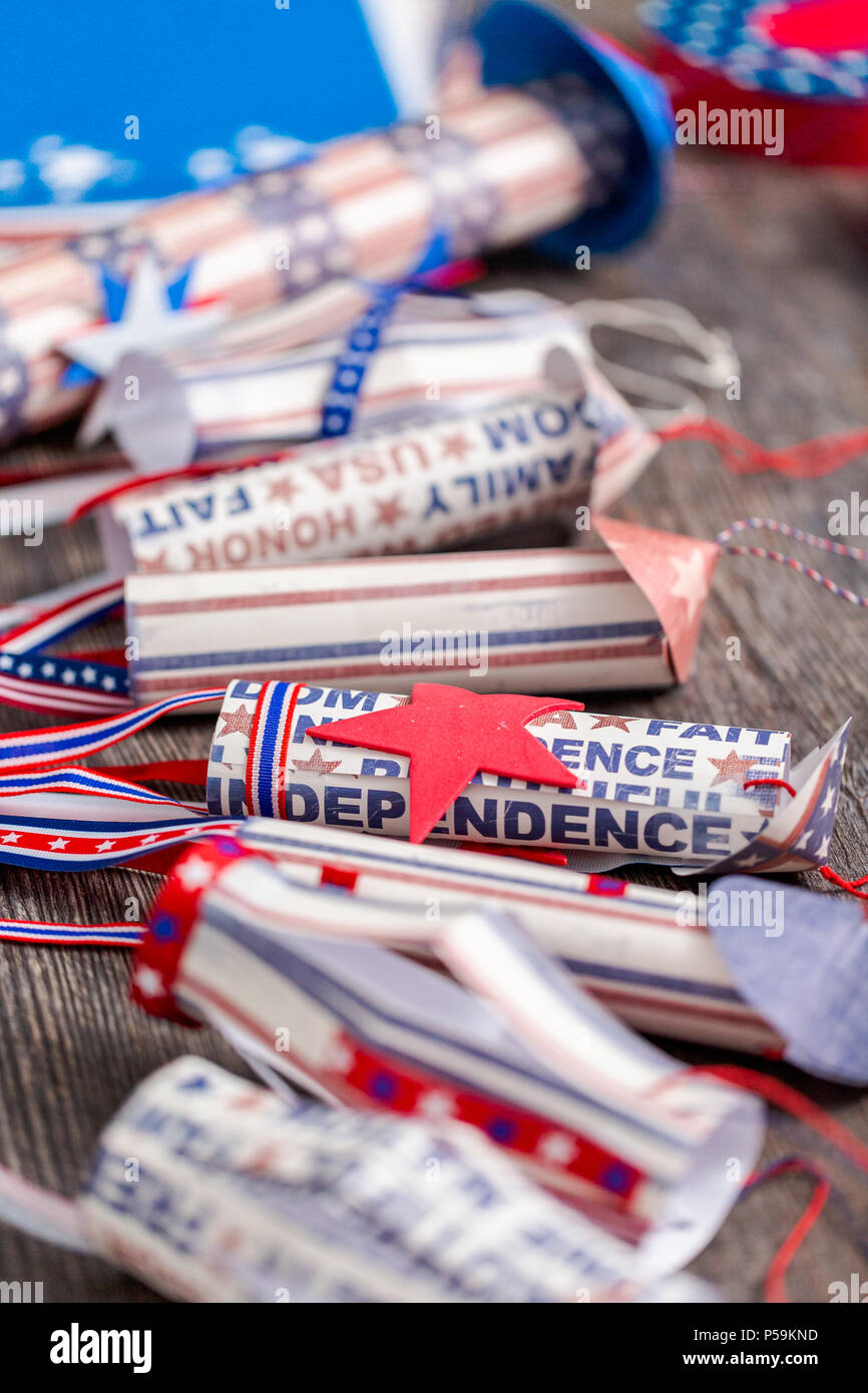 Paper firecrackers made from red, white and blue paper for July 4th ...