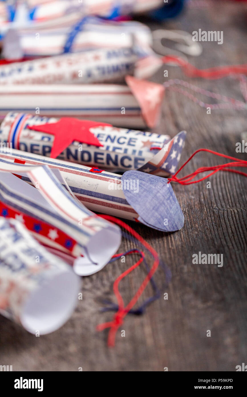 Paper firecrackers made from red, white and blue paper for July 4th ...
