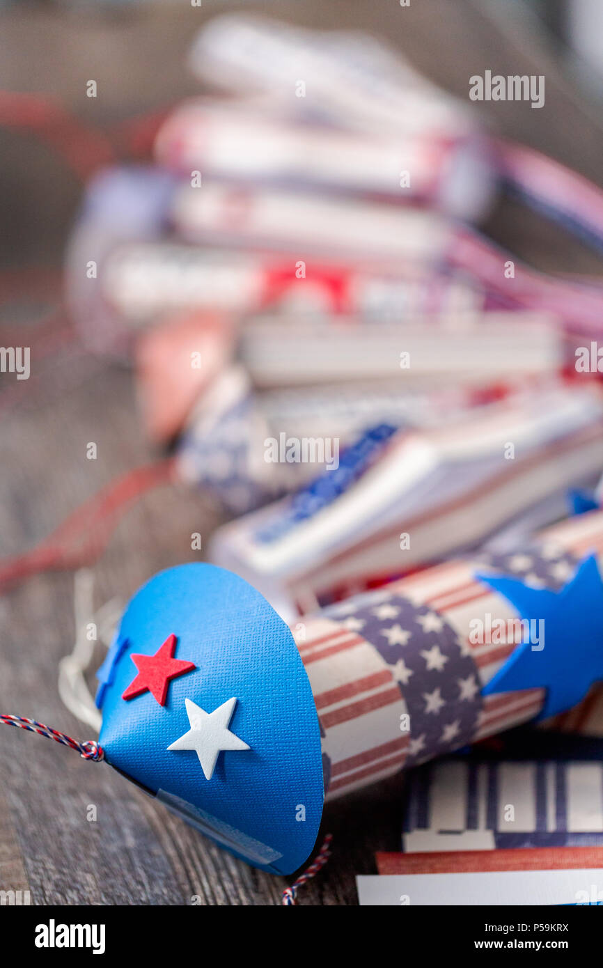 Paper firecrackers made from red, white and blue paper for July 4th ...