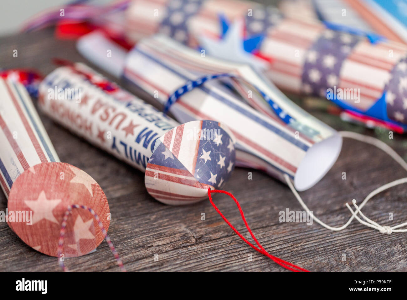 Paper firecrackers made from red, white and blue paper for July 4th ...