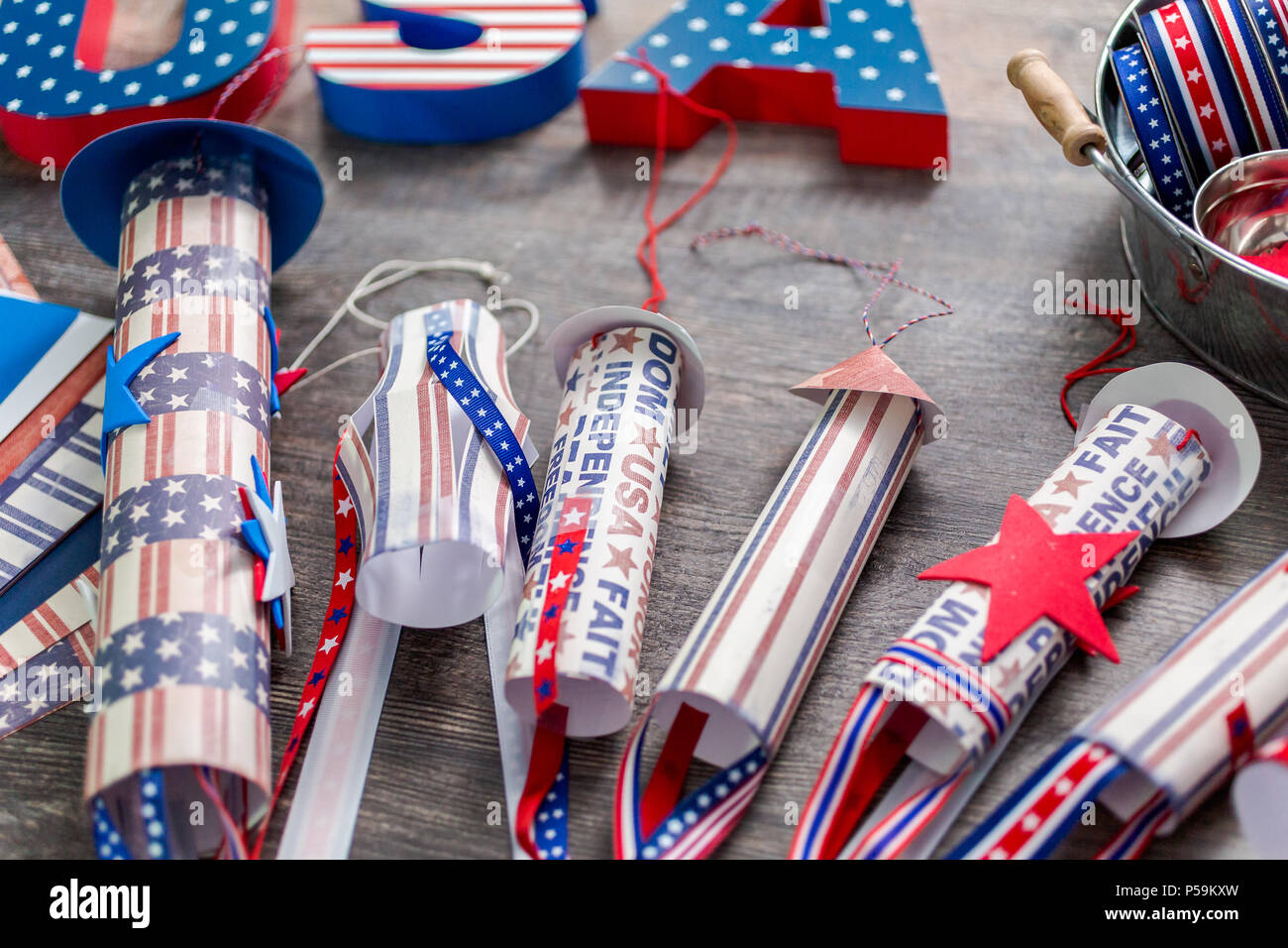 Paper firecrackers made from red, white and blue paper for July 4th ...