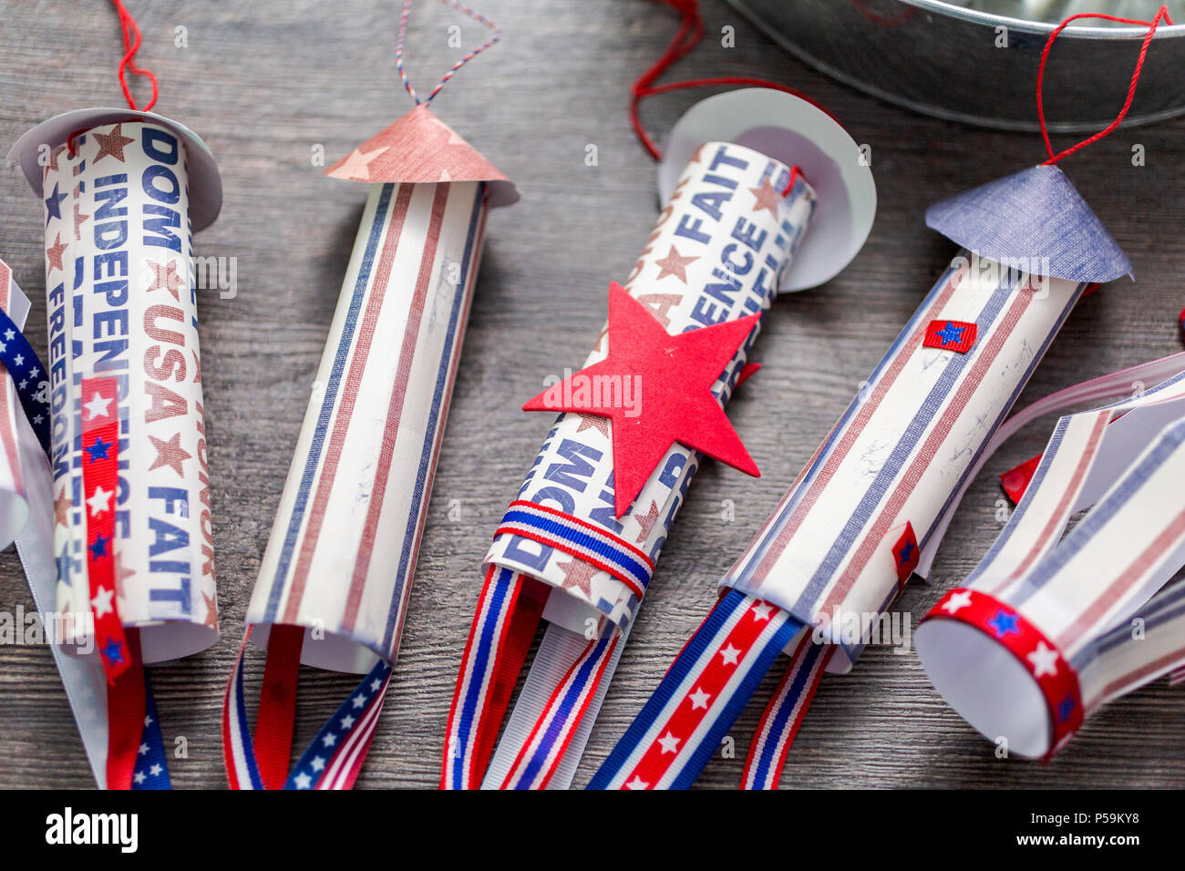 Paper firecrackers made from red, white and blue paper for July 4th ...