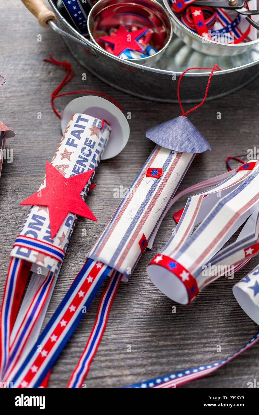 Paper firecrackers made from red, white and blue paper for July 4th ...