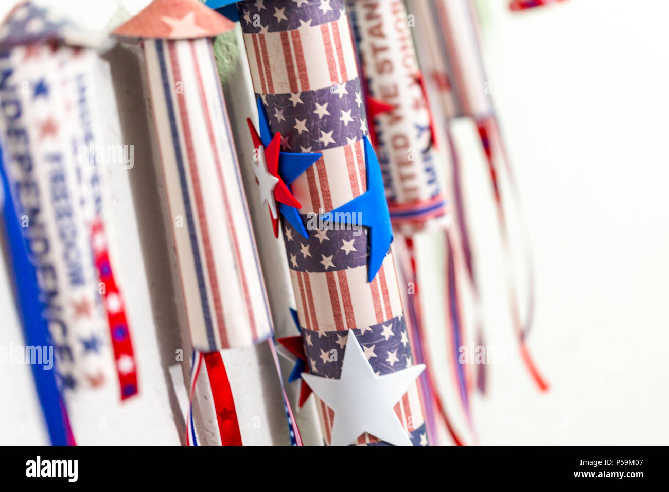 Paper firecrackers made from red, white and blue paper for July 4th ...
