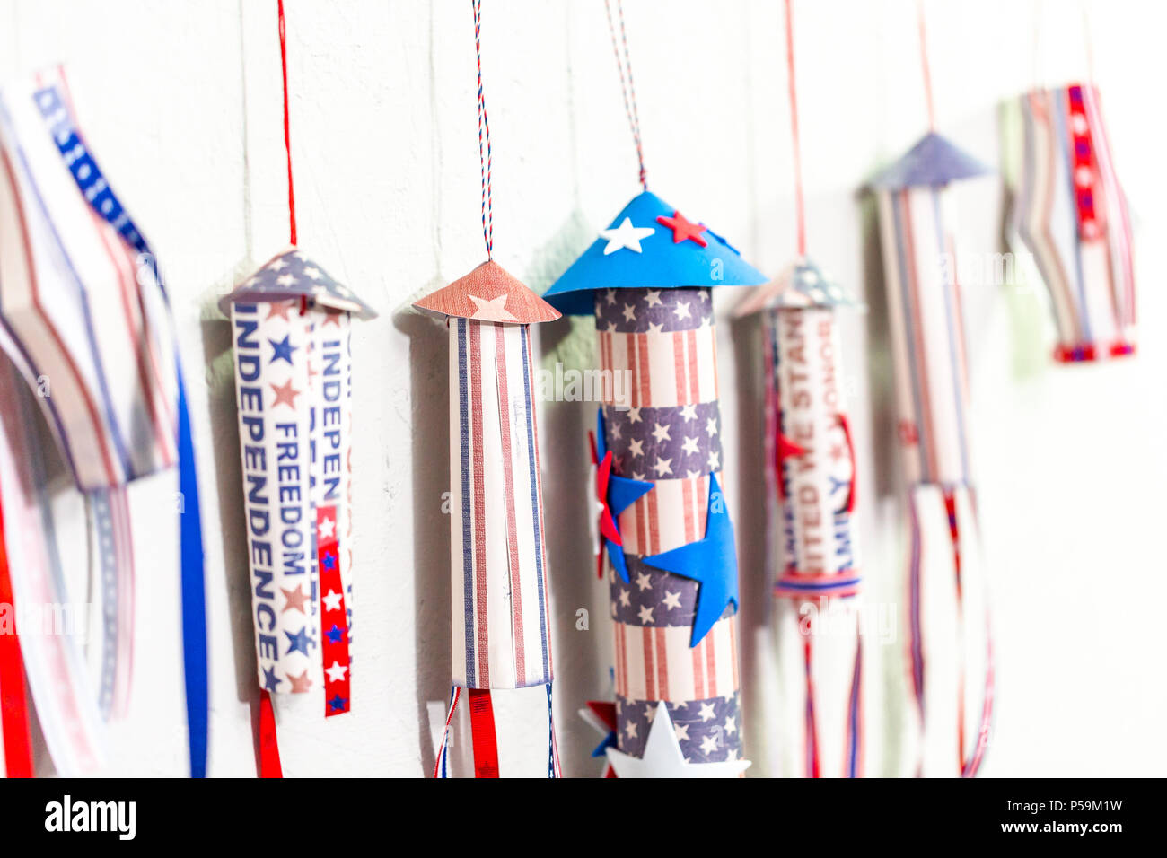 Paper firecrackers made from red, white and blue paper for July 4th ...