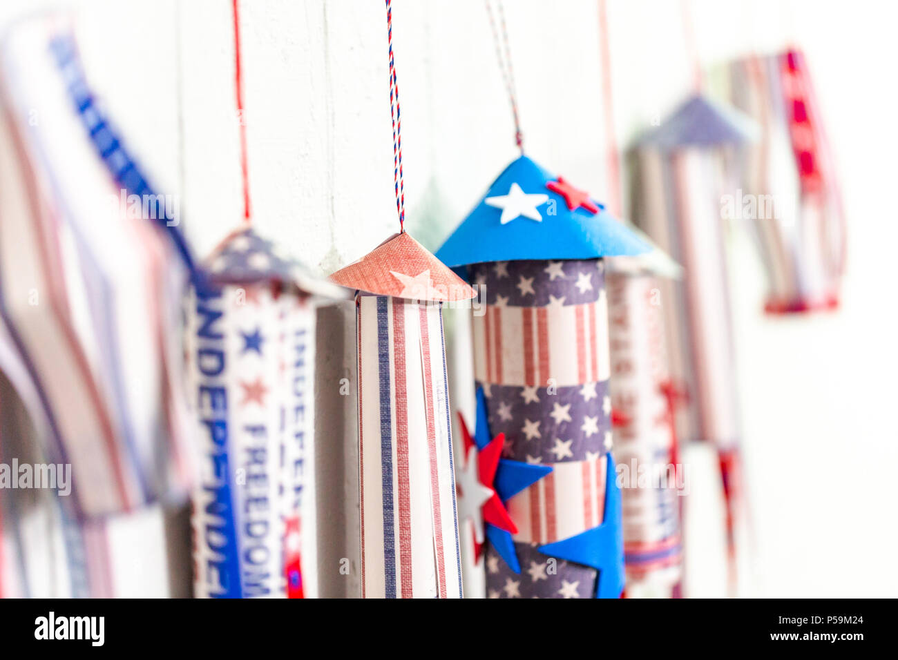 Paper firecrackers made from red, white and blue paper for July 4th ...