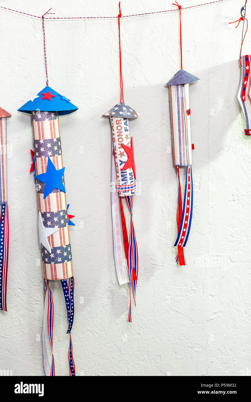 Paper firecrackers made from red, white and blue paper for July 4th ...