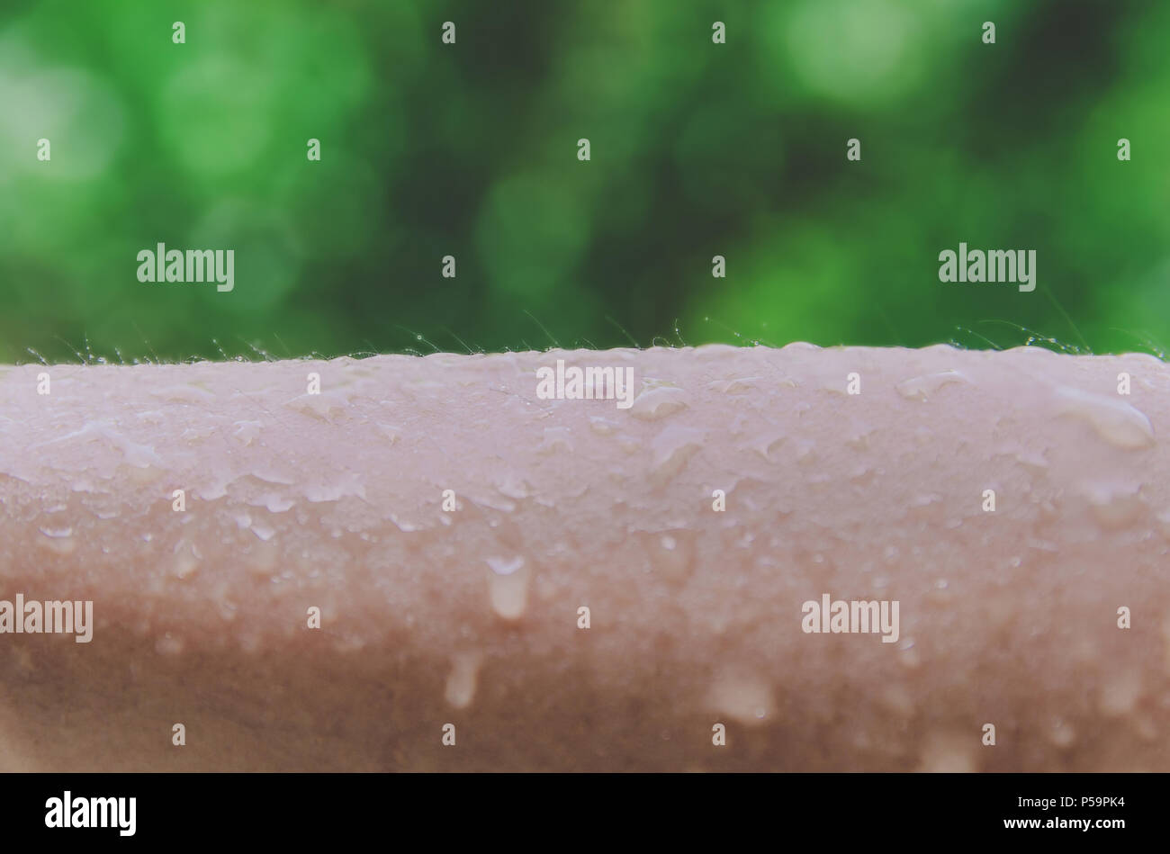 Close up of water drop on the human skin for wash and clean the skin ...