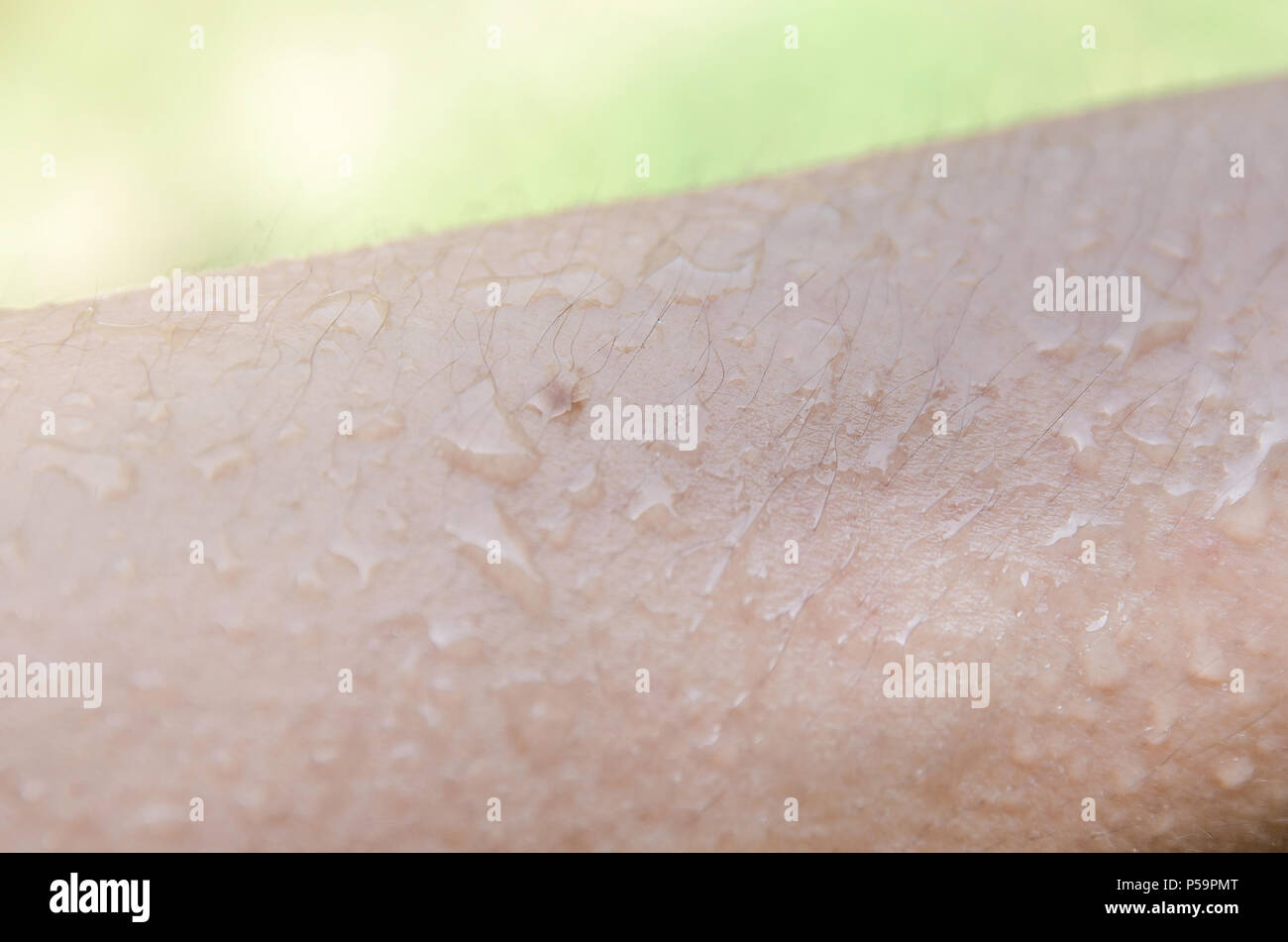 Close up of water drop on the human skin for wash and clean the skin ...