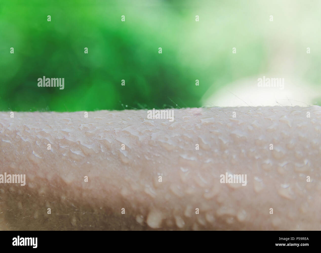 Close up of water drop on the human skin for wash and clean the skin ...